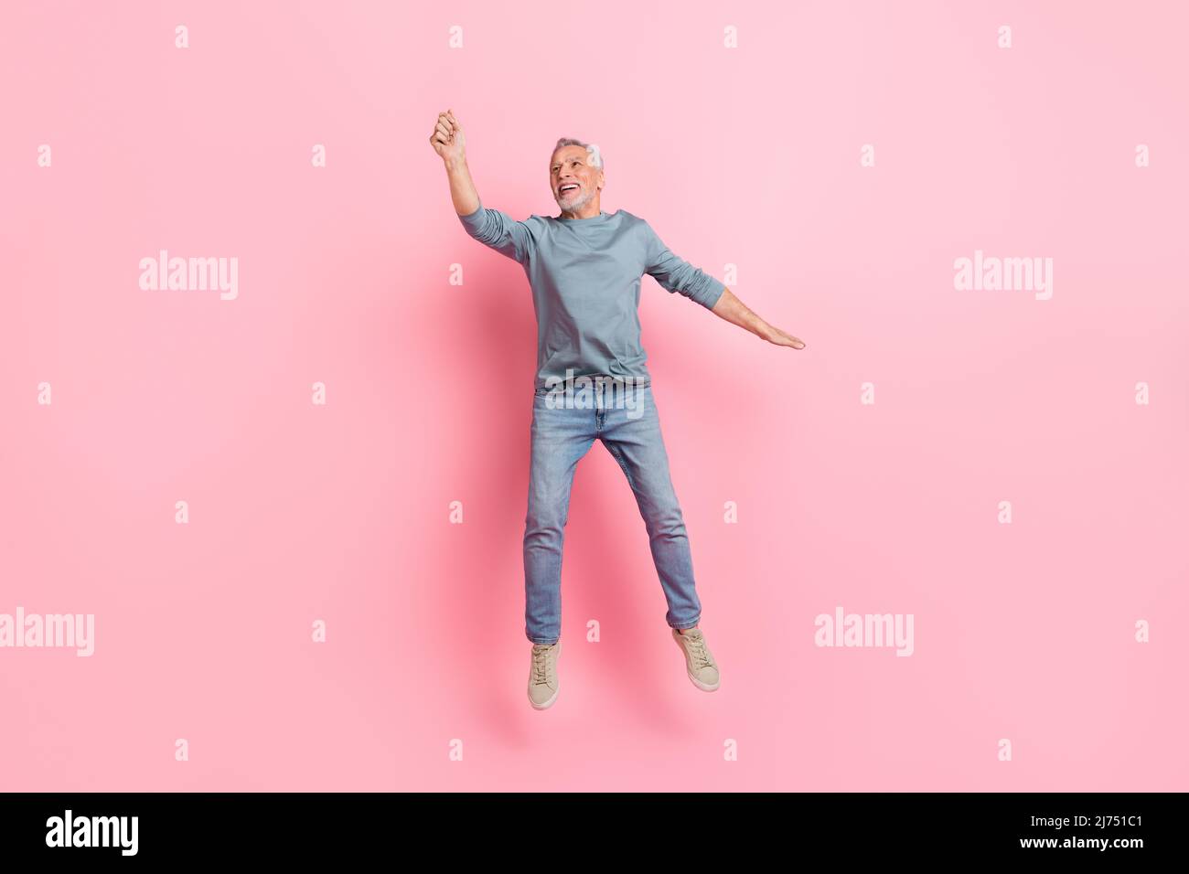 Full length body size view of attractive cheery grey-haired man jumping ...