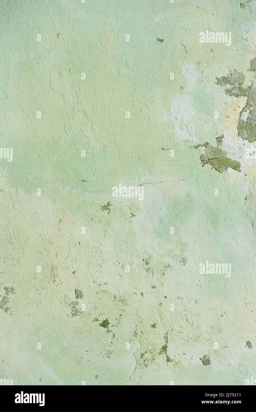 Old flaky wall with destroyed plaster. Renovation of old house ...