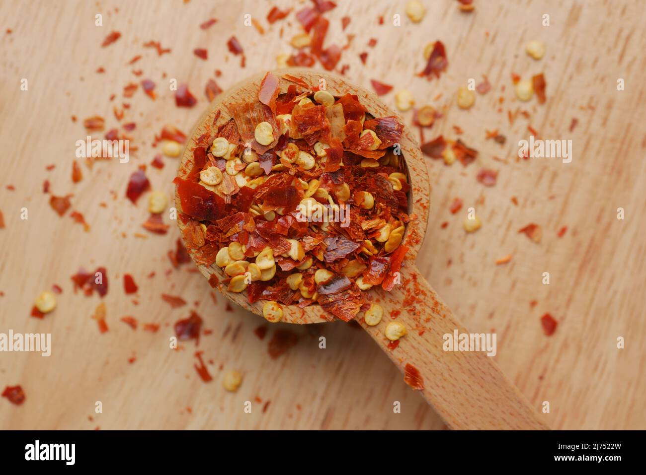 Red chili in wooden spoon hi-res stock photography and images - Alamy