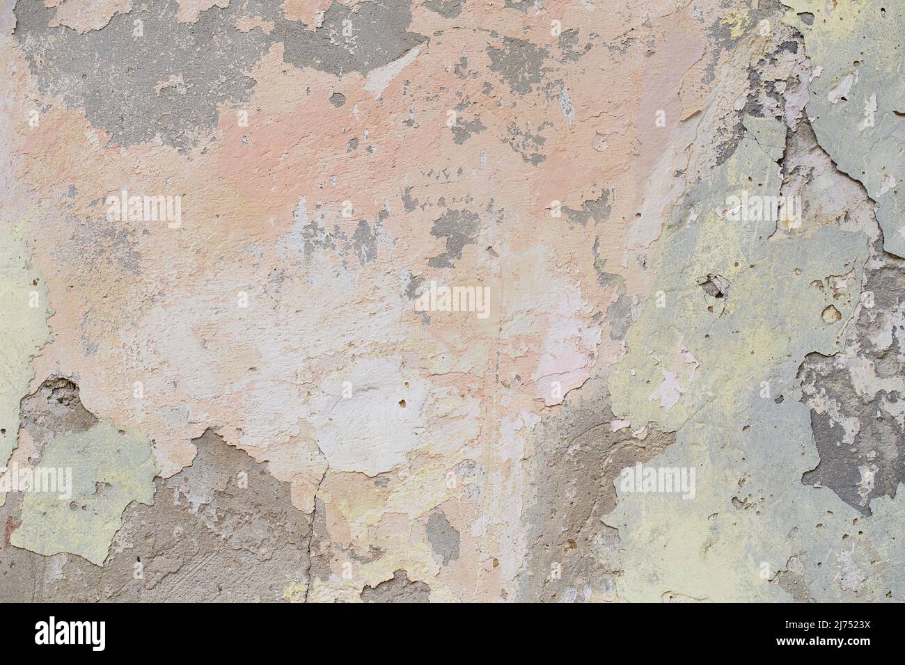 Old flaky wall with destroyed plaster. Renovation of old house ...