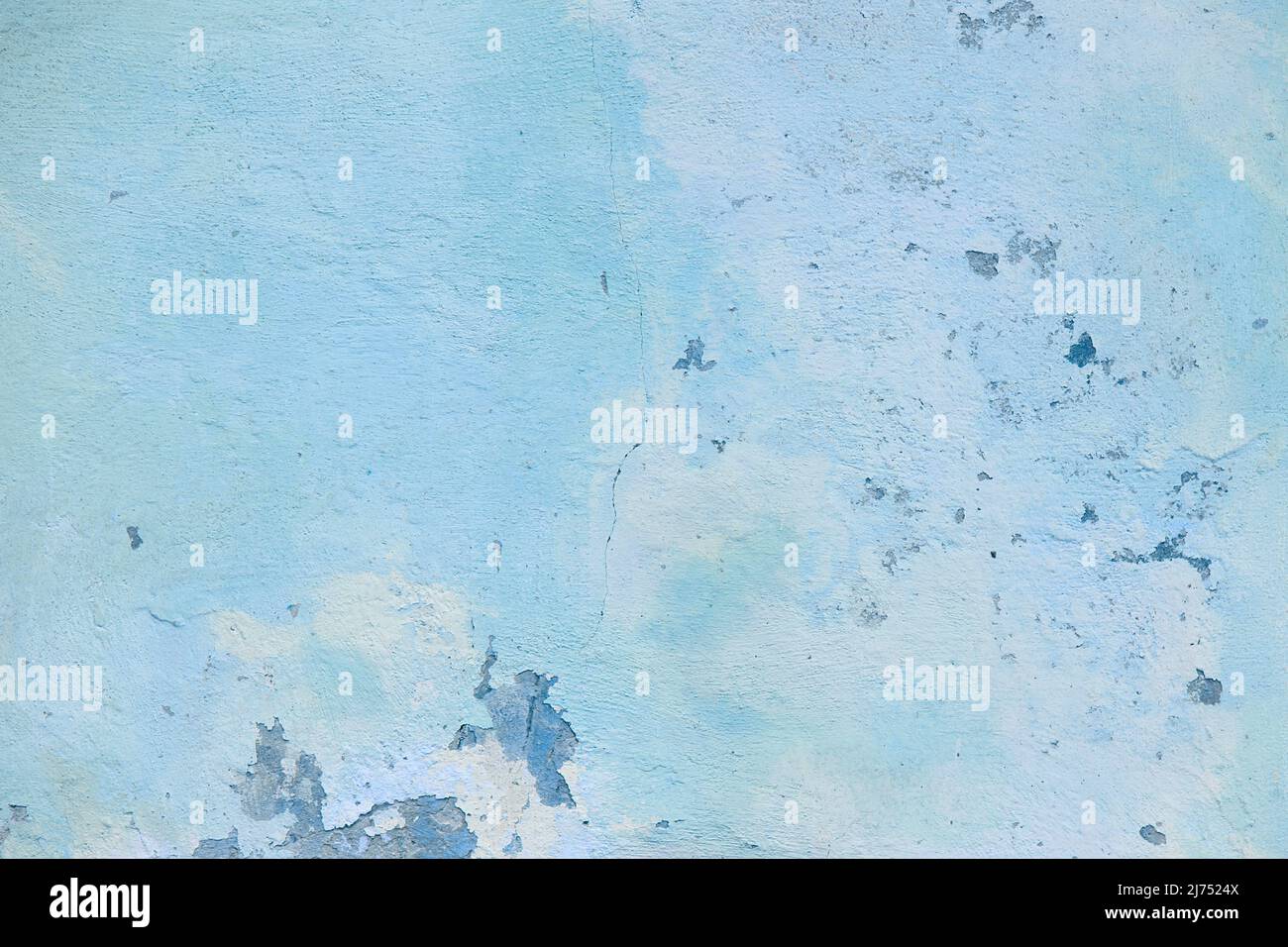 Old flaky wall with destroyed plaster. Renovation of old house ...