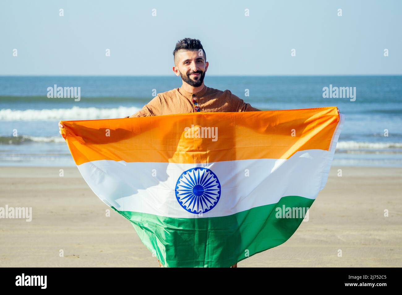 Indian man holding flag hi-res stock photography and images - Alamy