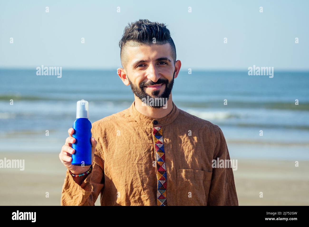 Protecting sun man hi-res stock photography and images - Alamy