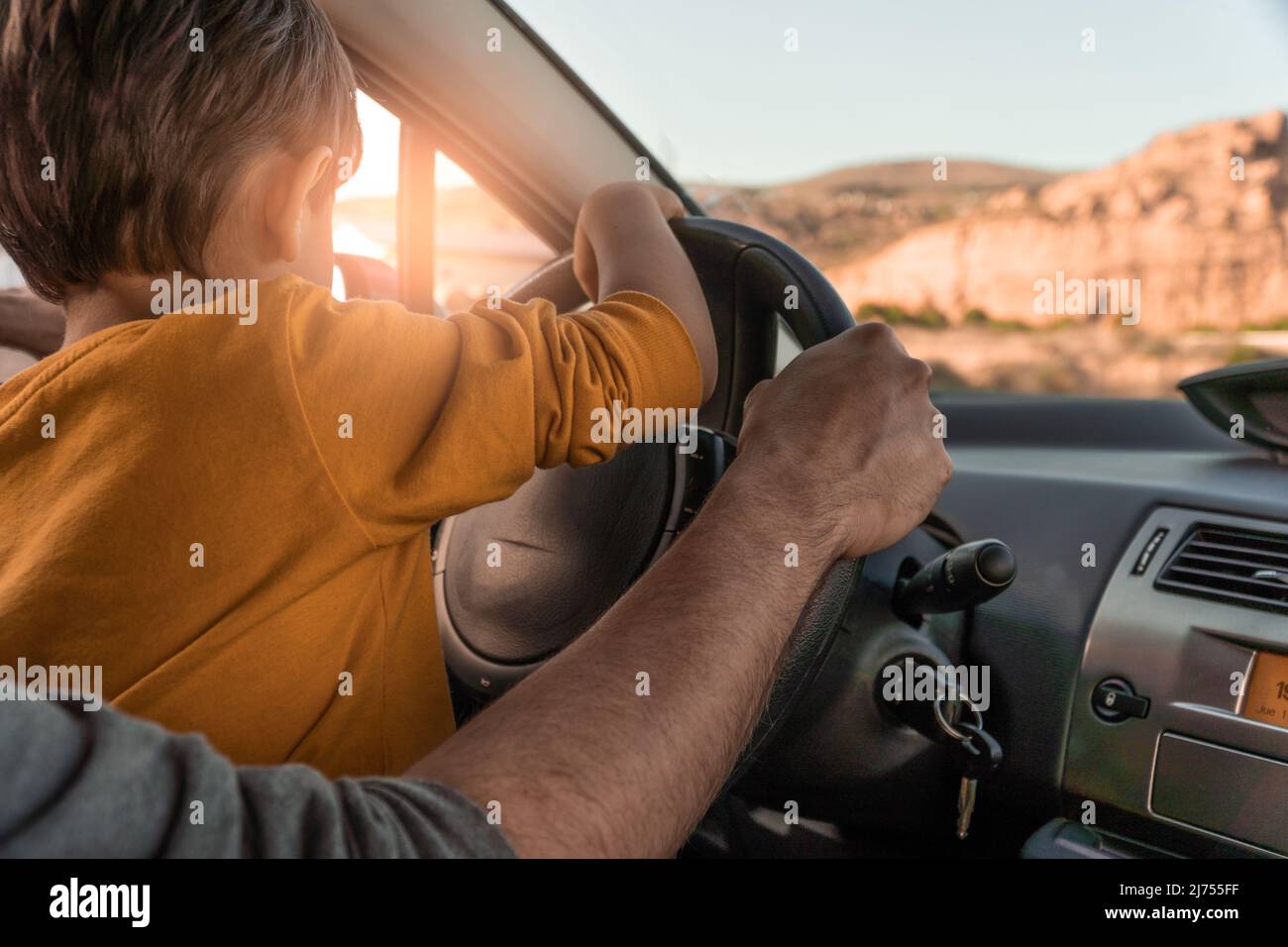 Father teaching son to drive car hi-res stock photography and images ...