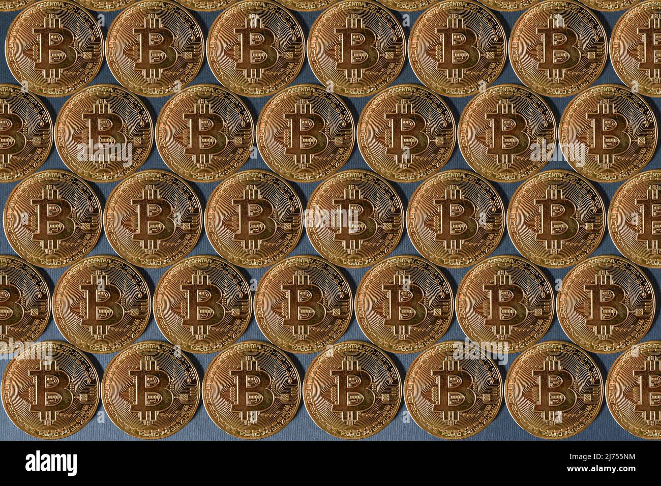 Coins of golden bitcoin, texture from coins on a gray background Stock ...