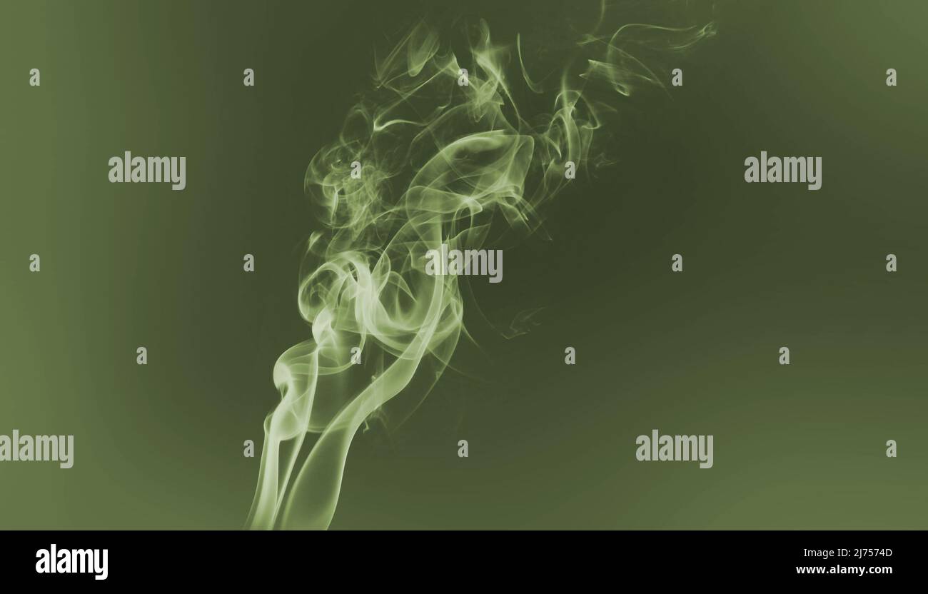 Beautiful dreamy sky with soft pink and mint clouds and smoke over them ...