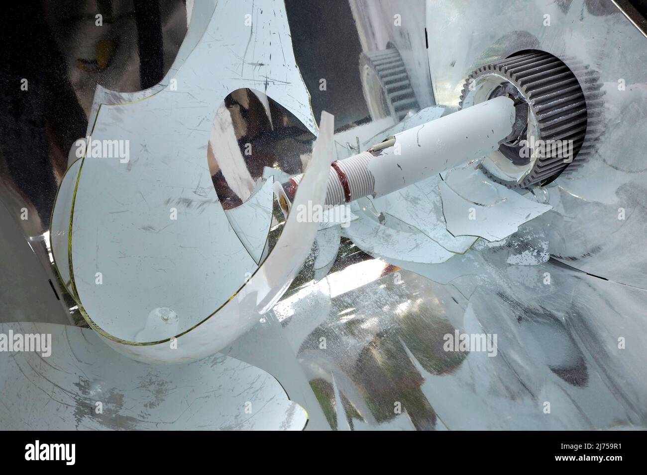 Sharp glass shards of a broken induction lamp Stock Photo - Alamy