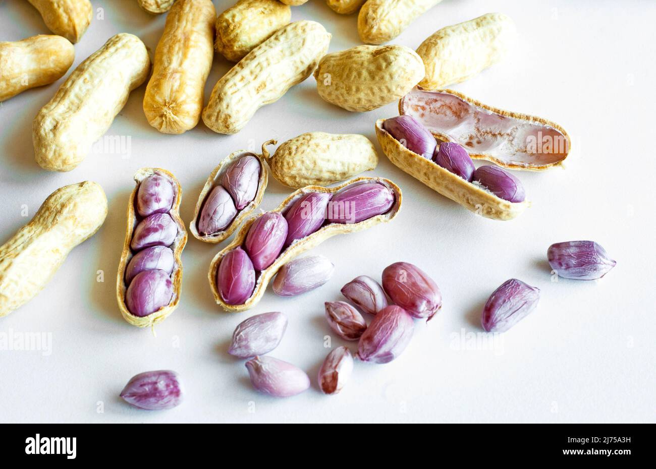 Boiled peanuts on white background Stock Photo - Alamy