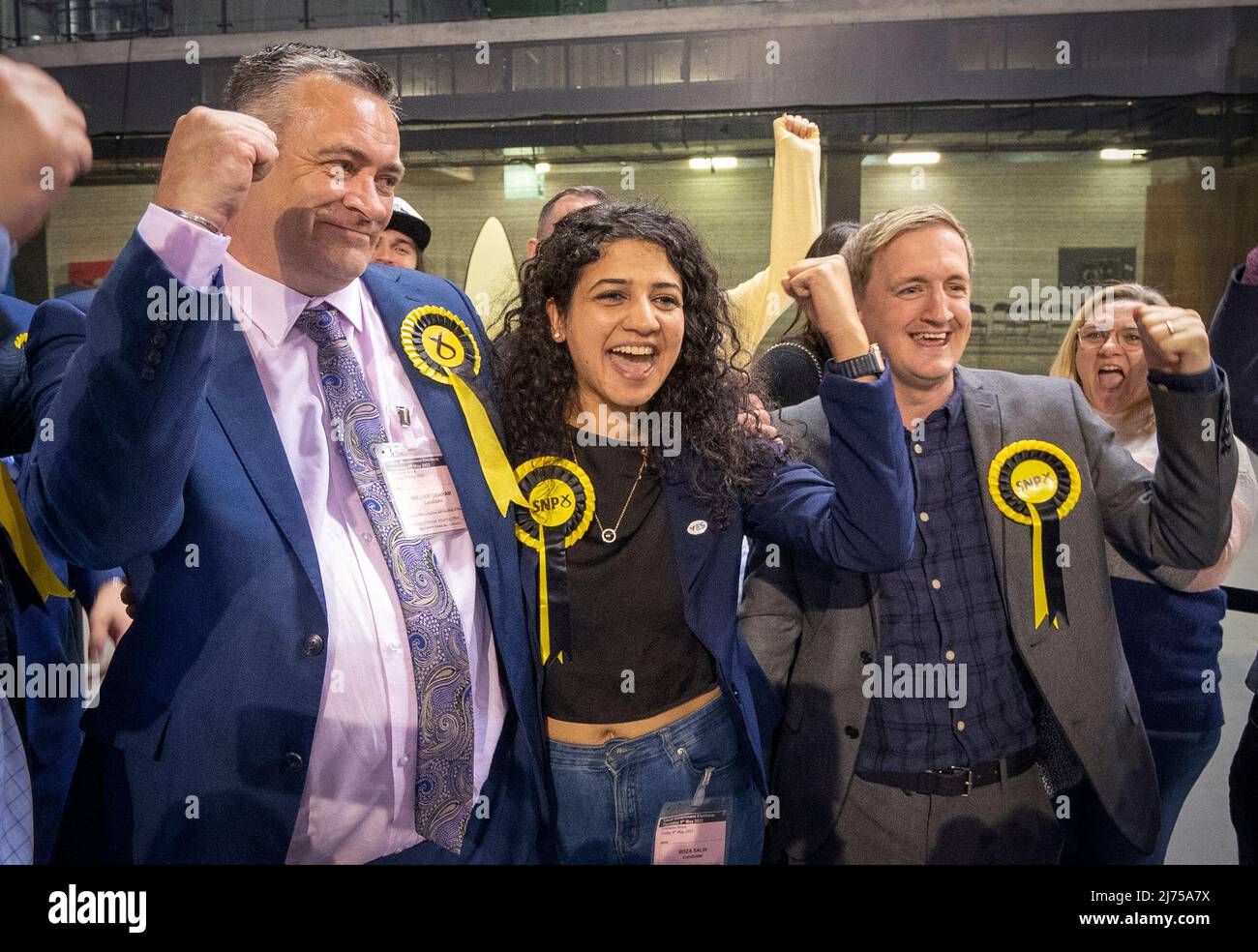SNP's Roza Salih and William Graham (left) celebrate at the Glasgow ...