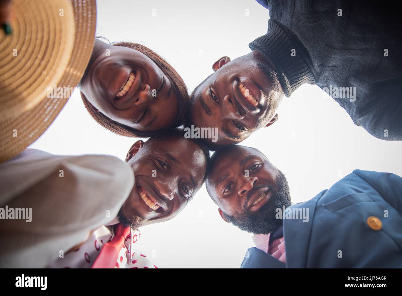 Group of african friends do head to head and smile together, happiness ...
