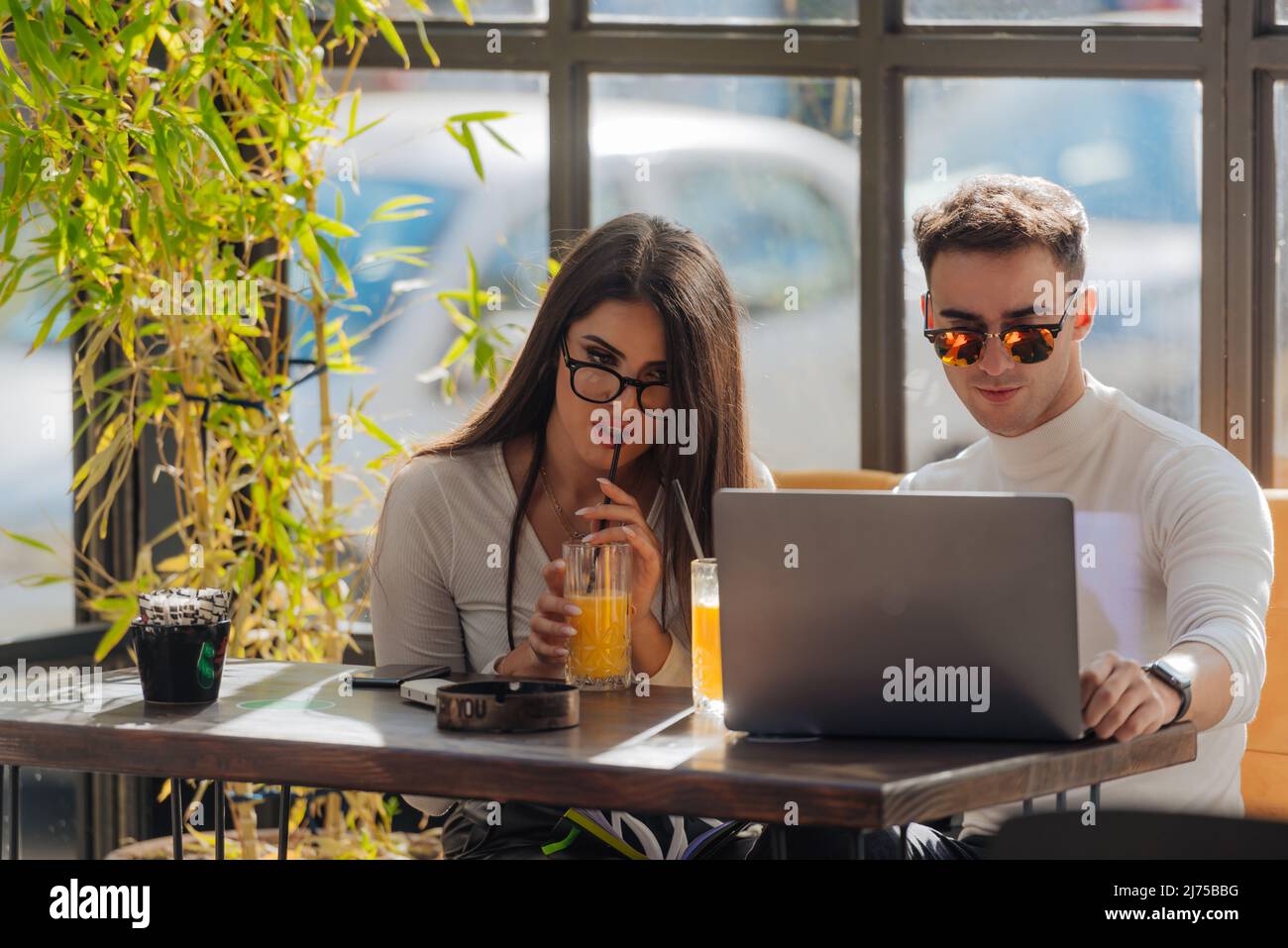 Co-workers spending time together on a break while working on a project ...