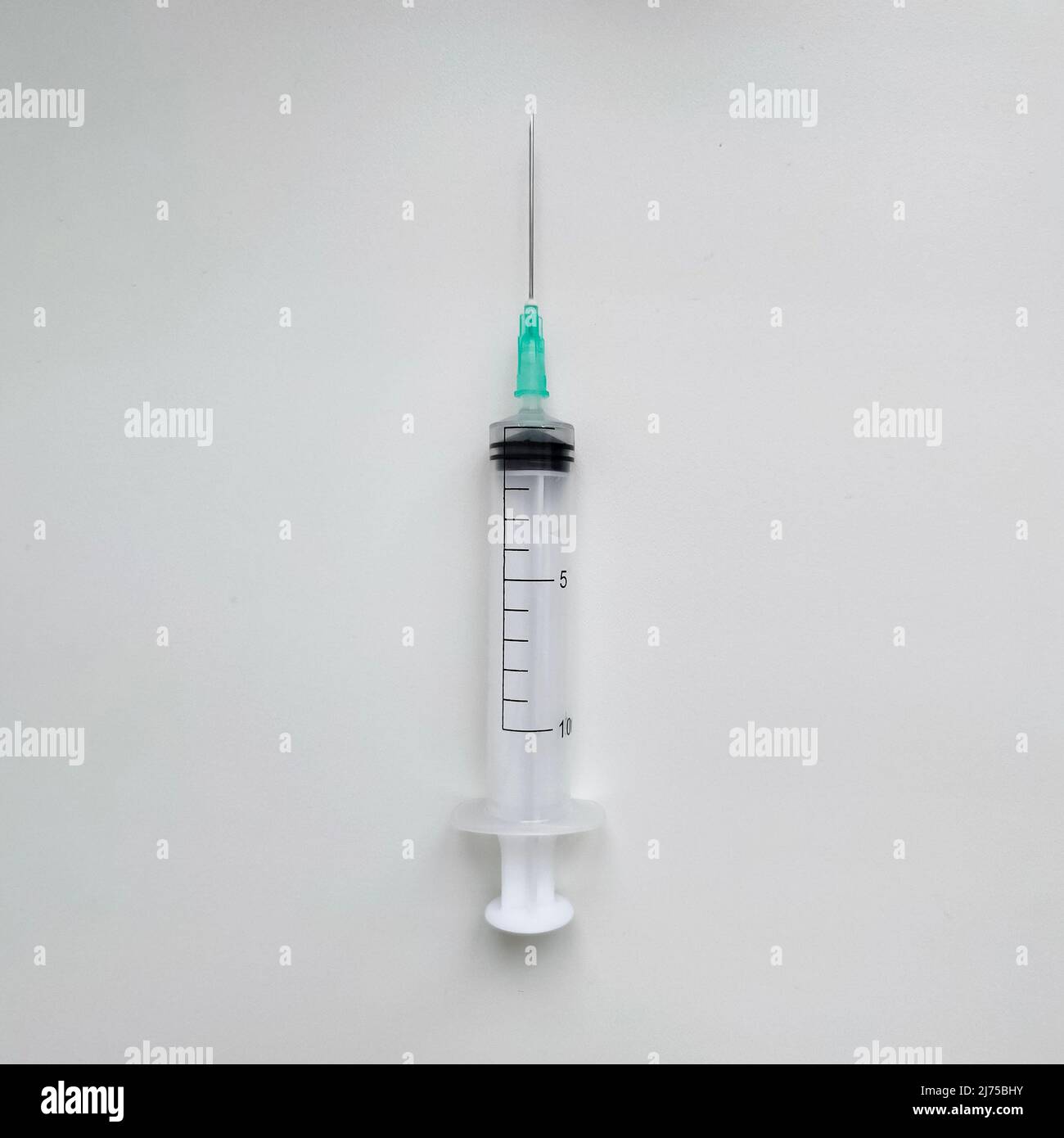 Disposable medical syringe with needle on white background Stock Photo ...