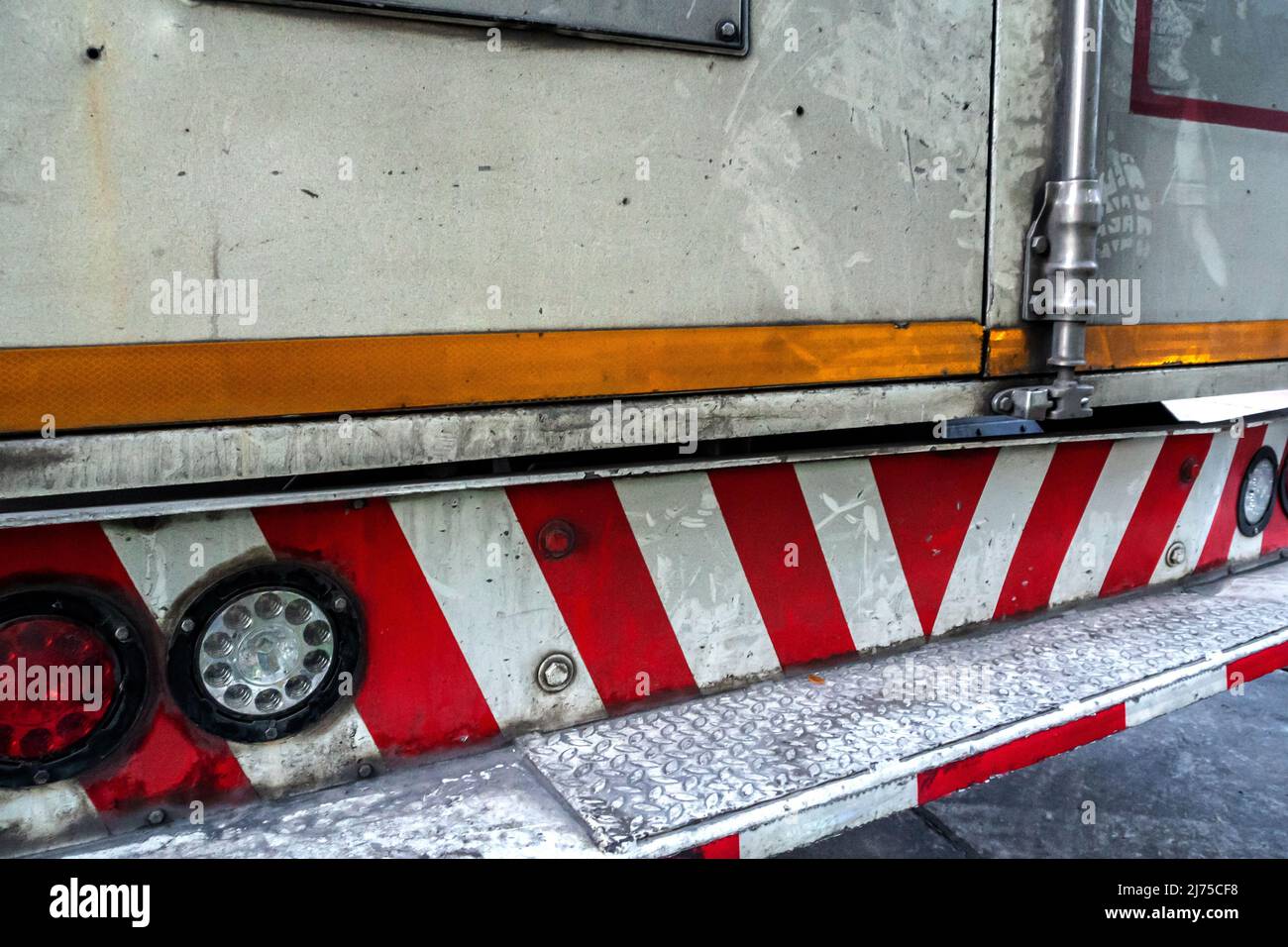 Red and white striped sign of truck rear bumper Stock Photo - Alamy