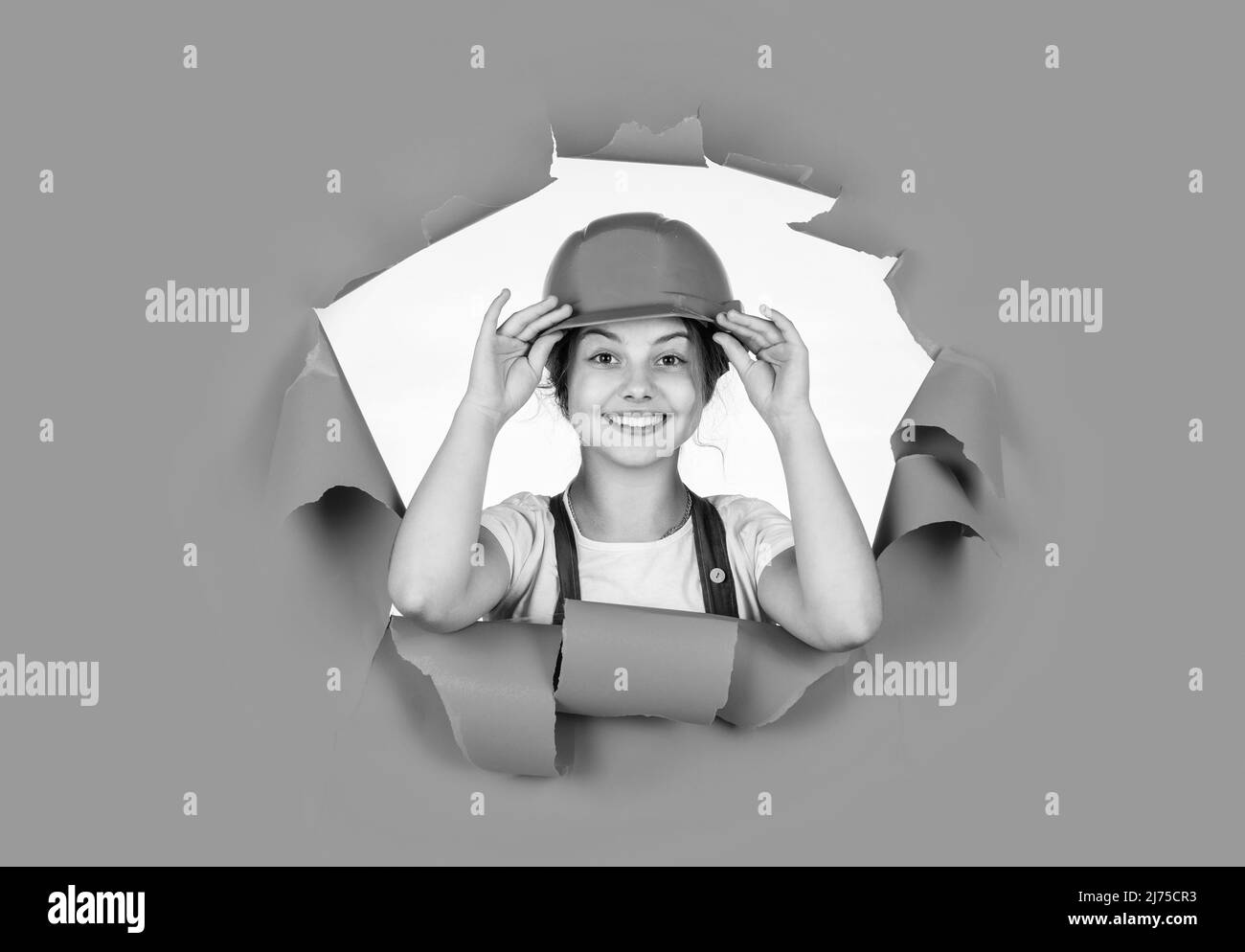 Repairing is what I do well. future engineer. happy kid in safety hard ...