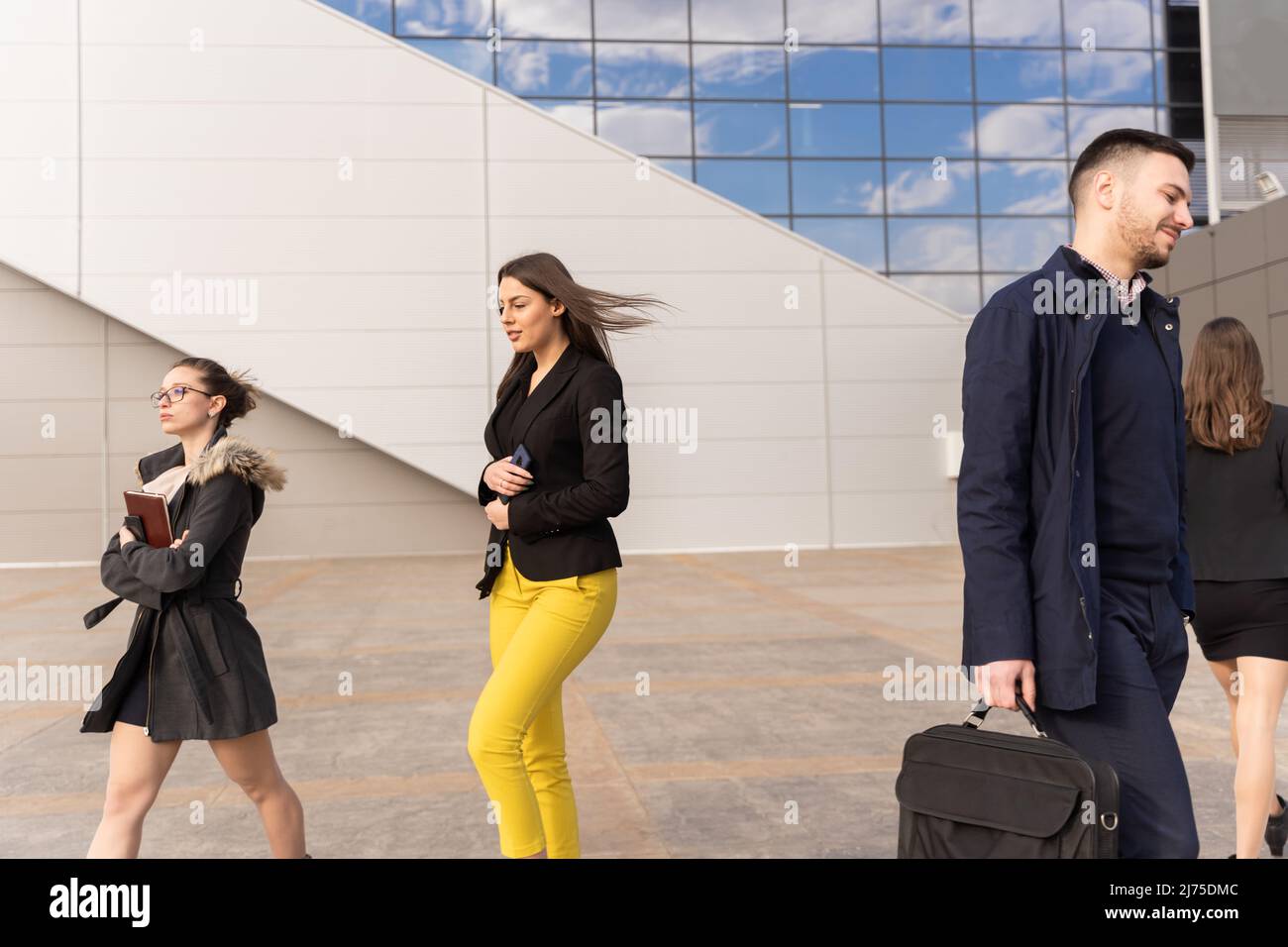 Group of young business people are thinking and walking fast Stock ...