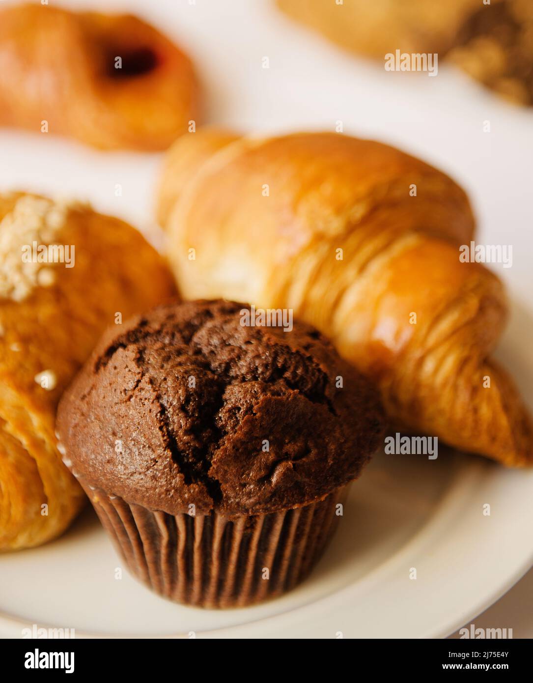 chocolate muffin, croissant, and assorted pastries Stock Photo - Alamy