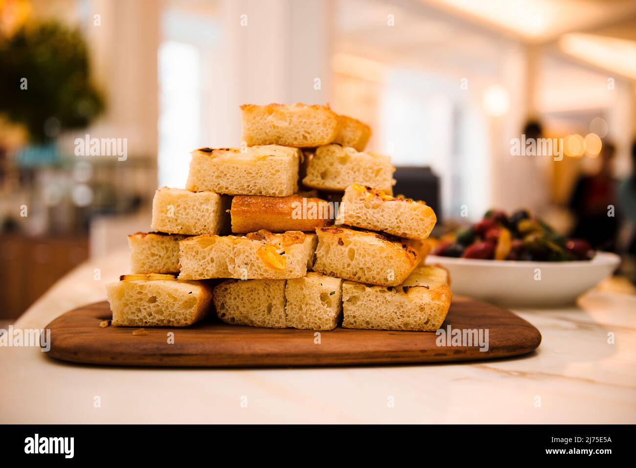Italian bread with cheese topping Stock Photo - Alamy
