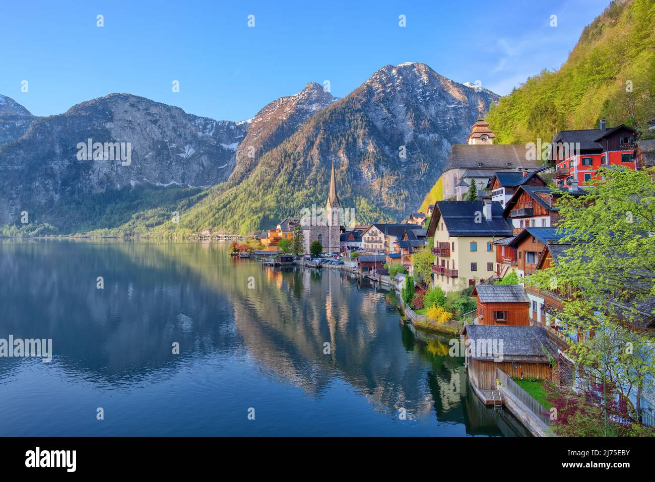 Scenic picture-postcard view of famous Hallstatt mountain village in ...