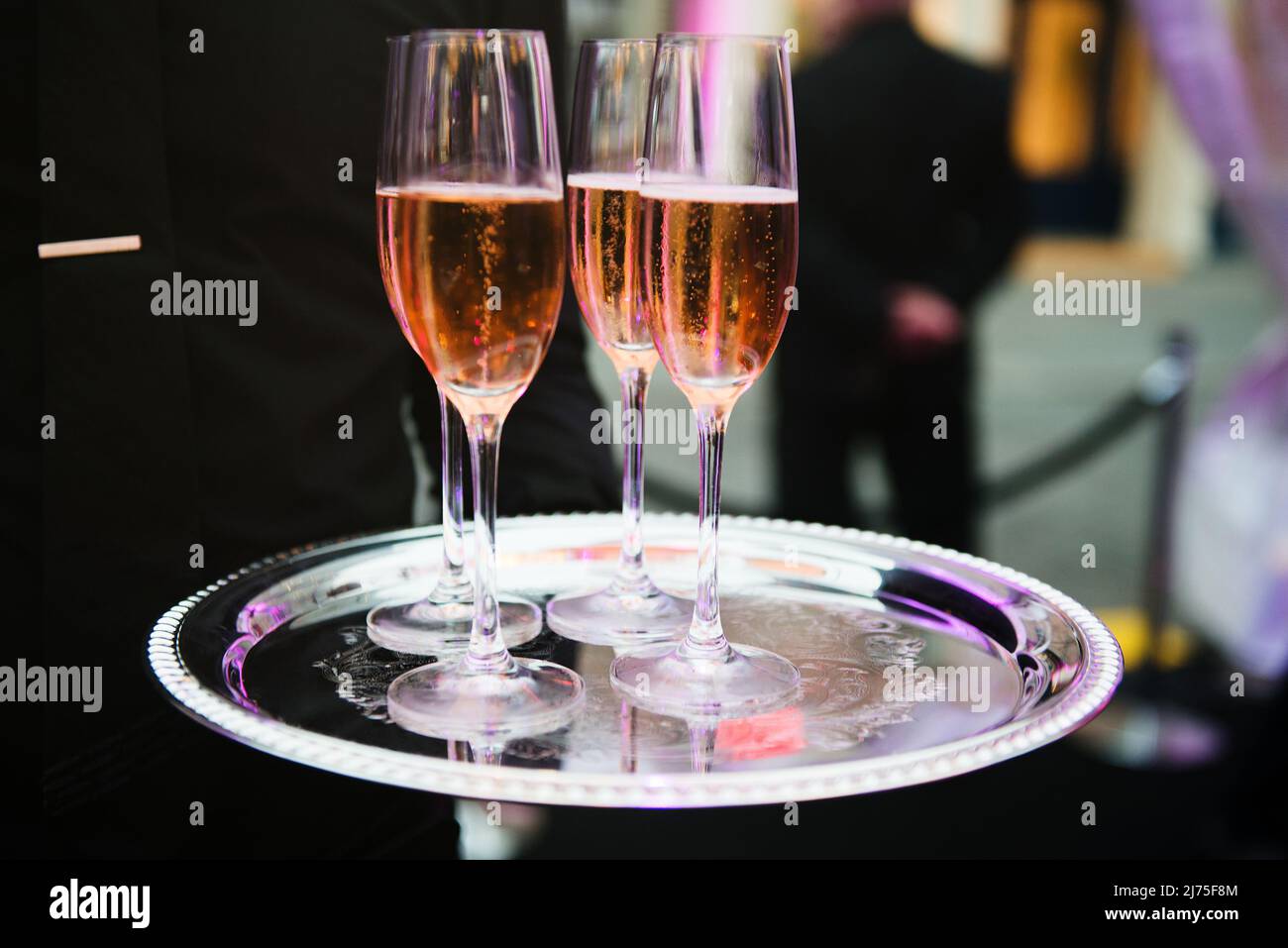 Champagne glasses on silver tray hi-res stock photography and images ...