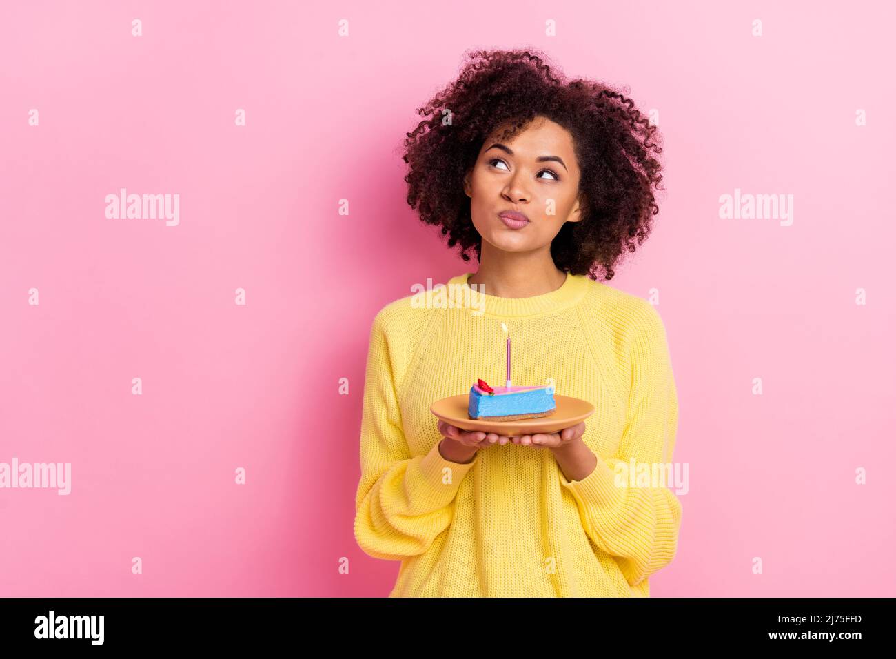 Photo of young lovely lady wonder think make wish look empty space cake ...