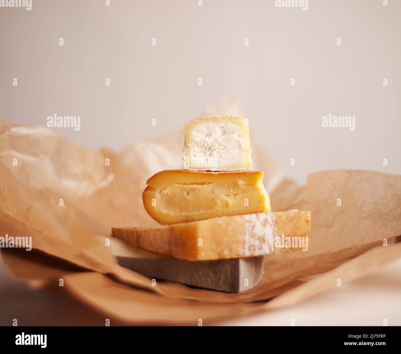 Assorted gourmet cheeses Stock Photo - Alamy