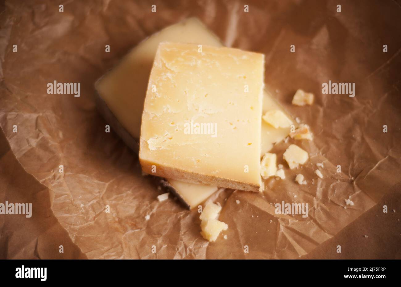 Parmesan cheese on parchment paper Stock Photo - Alamy