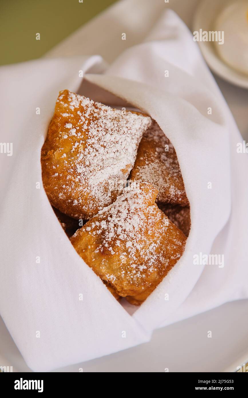 Beignets (deep-fried dough parcels, France Stock Photo - Alamy