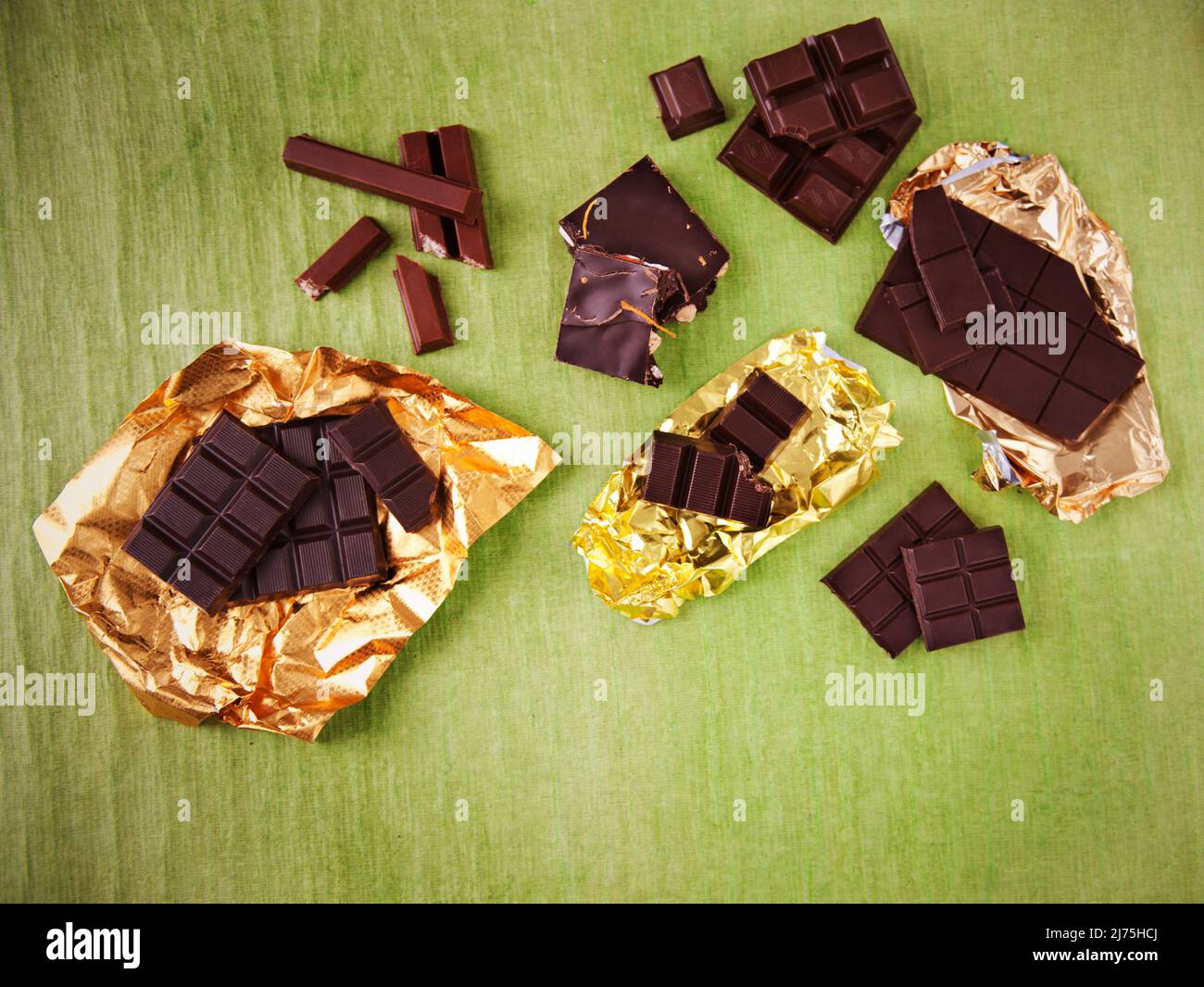 Assorted Chocolate Bars on Green; Wrappers Stock Photo - Alamy