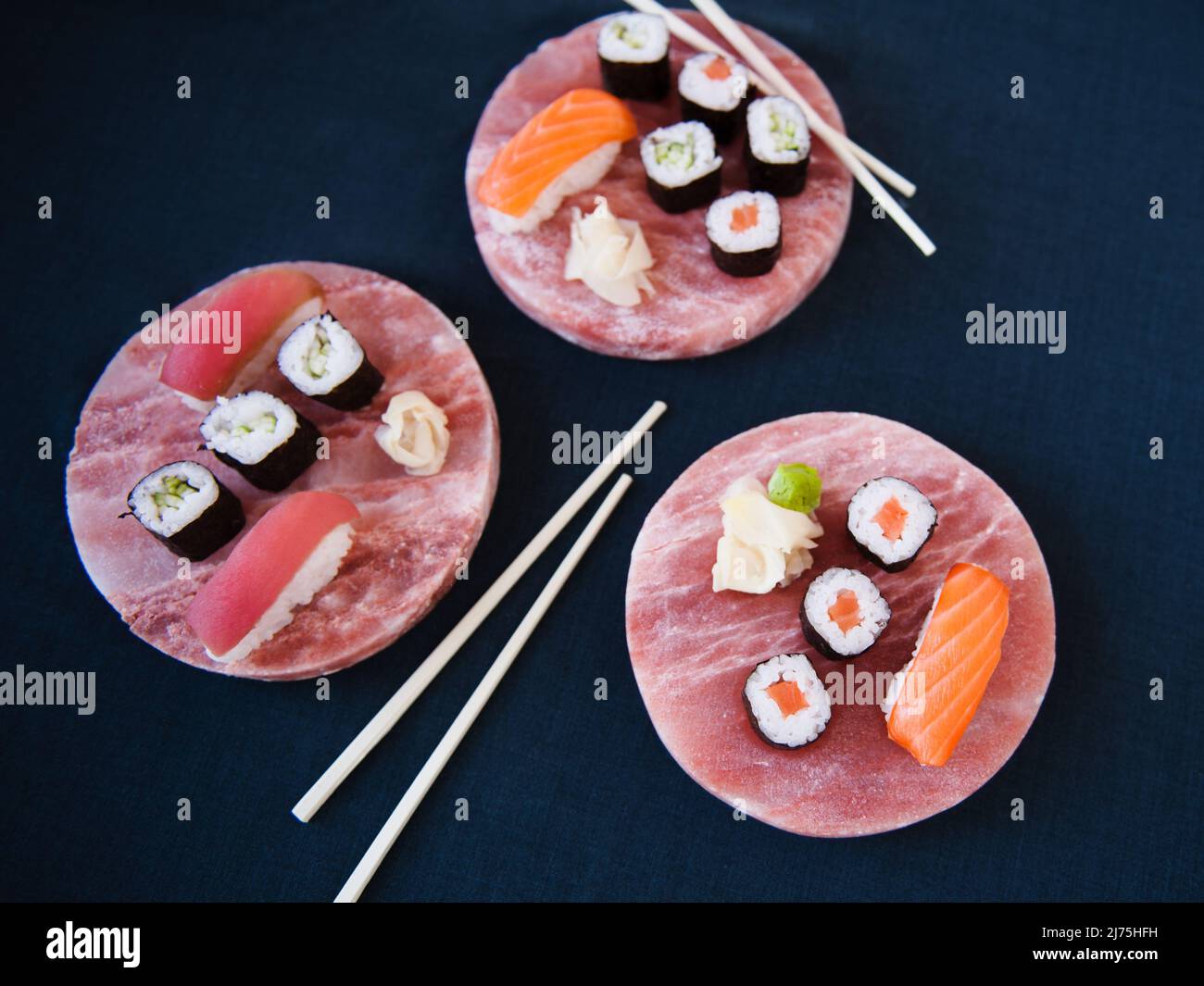 Sushi on Pink Himalayan Salt Plates Stock Photo - Alamy