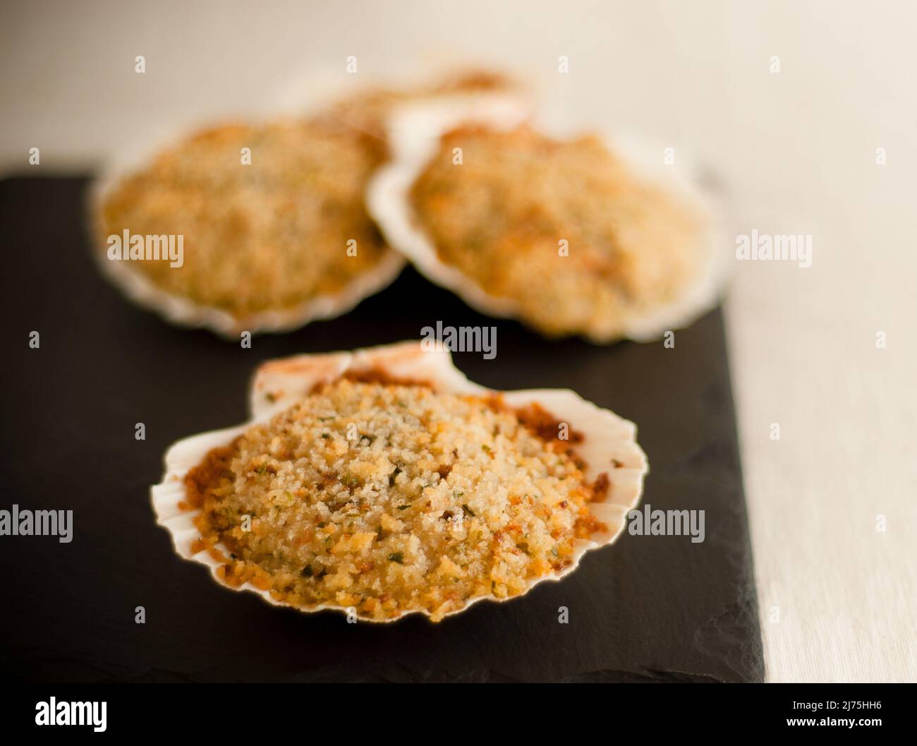 Lobster risotto on half shell Stock Photo - Alamy