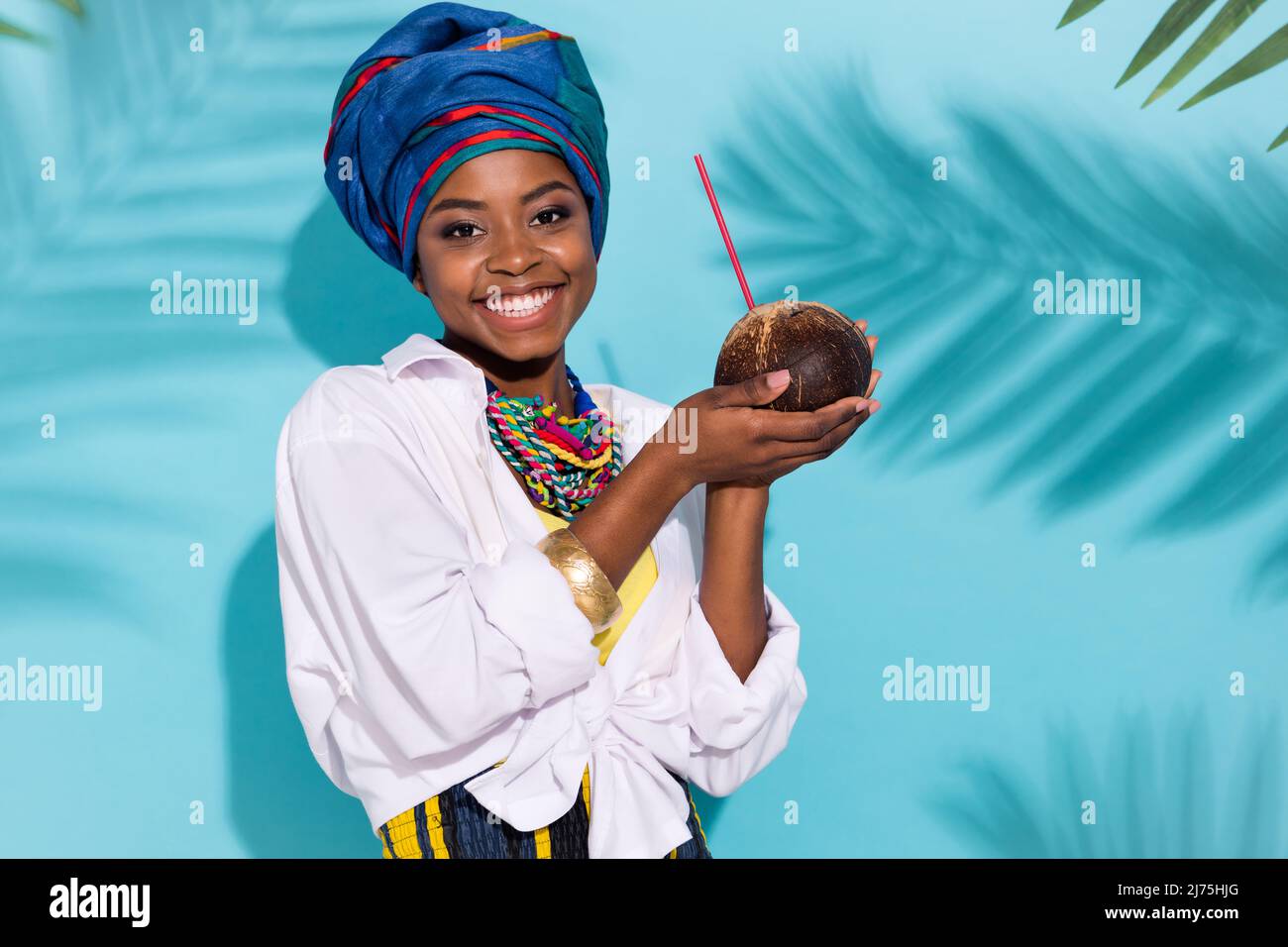 Portrait of pretty lady in national dress outfit hold tasty milkshake ...