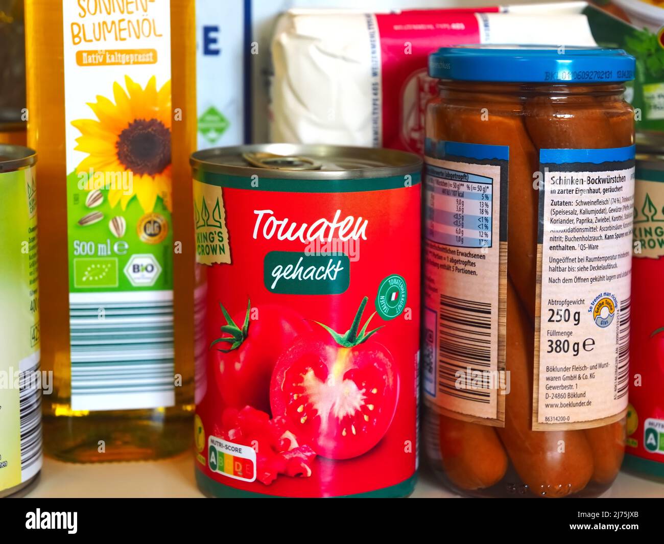 Shopping cart with long-life German groceries Stock Photo - Alamy