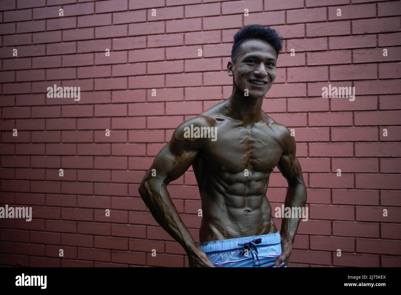 May 6, 2022, Kathmandu, Nepal: A bodybuilder flexes backstage during ...