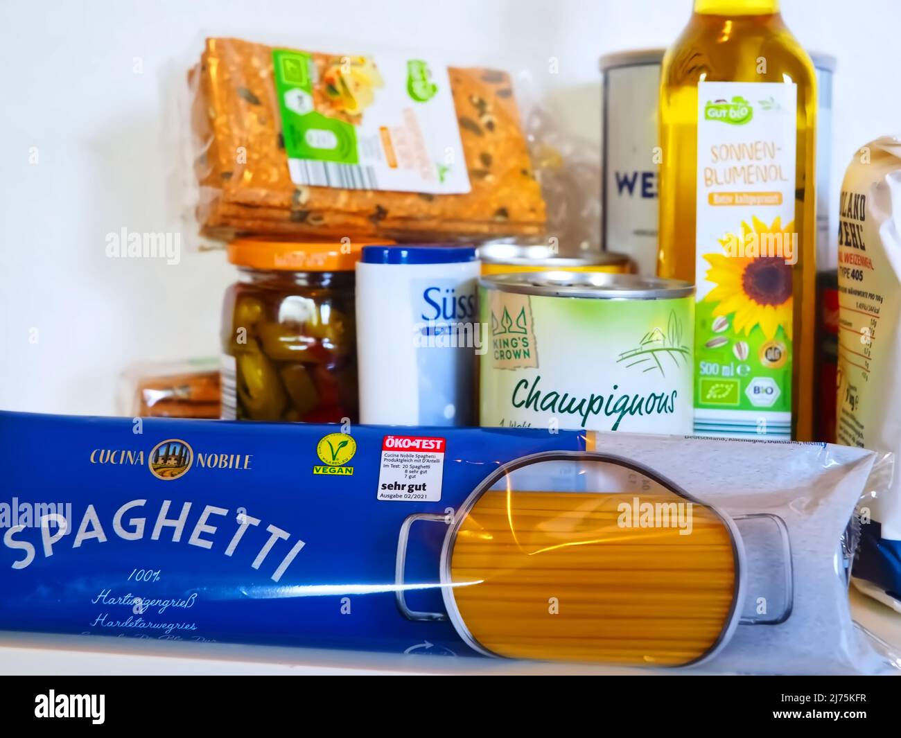 Shopping cart with long-life German groceries Stock Photo - Alamy