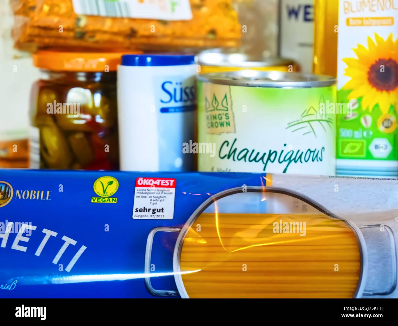 Shopping cart with long-life German groceries Stock Photo - Alamy