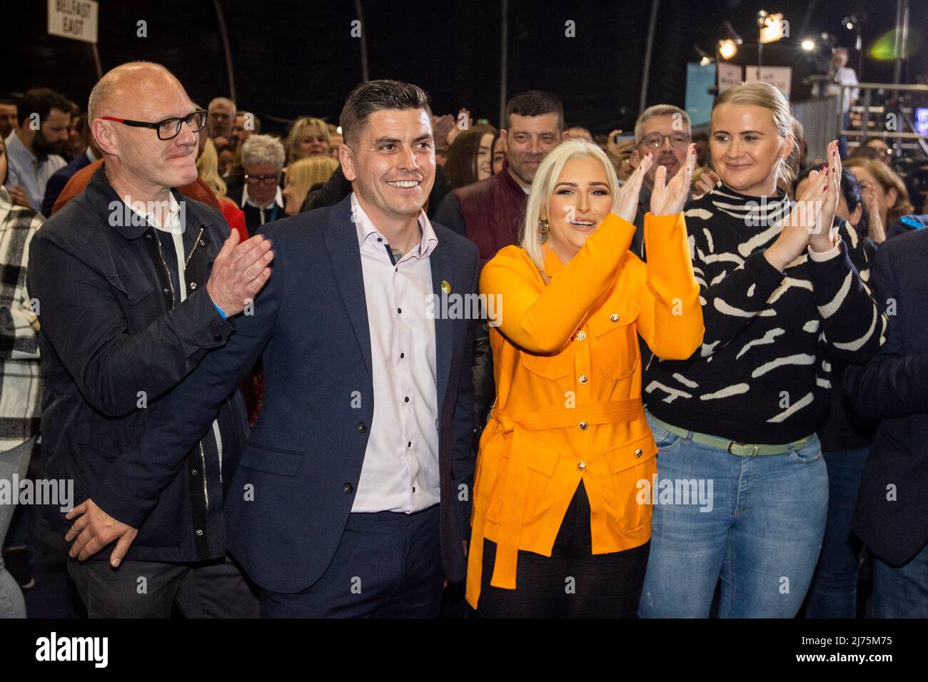 Sinn Fein's Daniel Baker (second from left) at the Titanic Exhibition ...