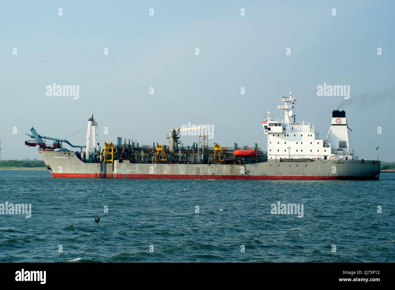 Huge cargo ship entering the Koch port for cargo loading and unloading ...