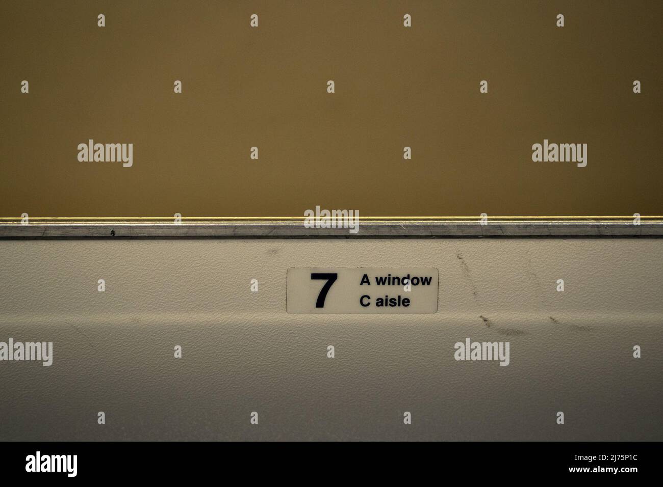 airplane seat number sign detail Stock Photo - Alamy