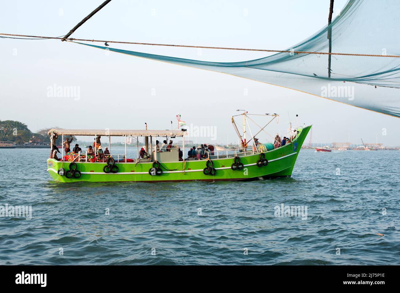 Fishing boat and fishermen at Kochi state Kerala India 02 04 2010 Stock ...