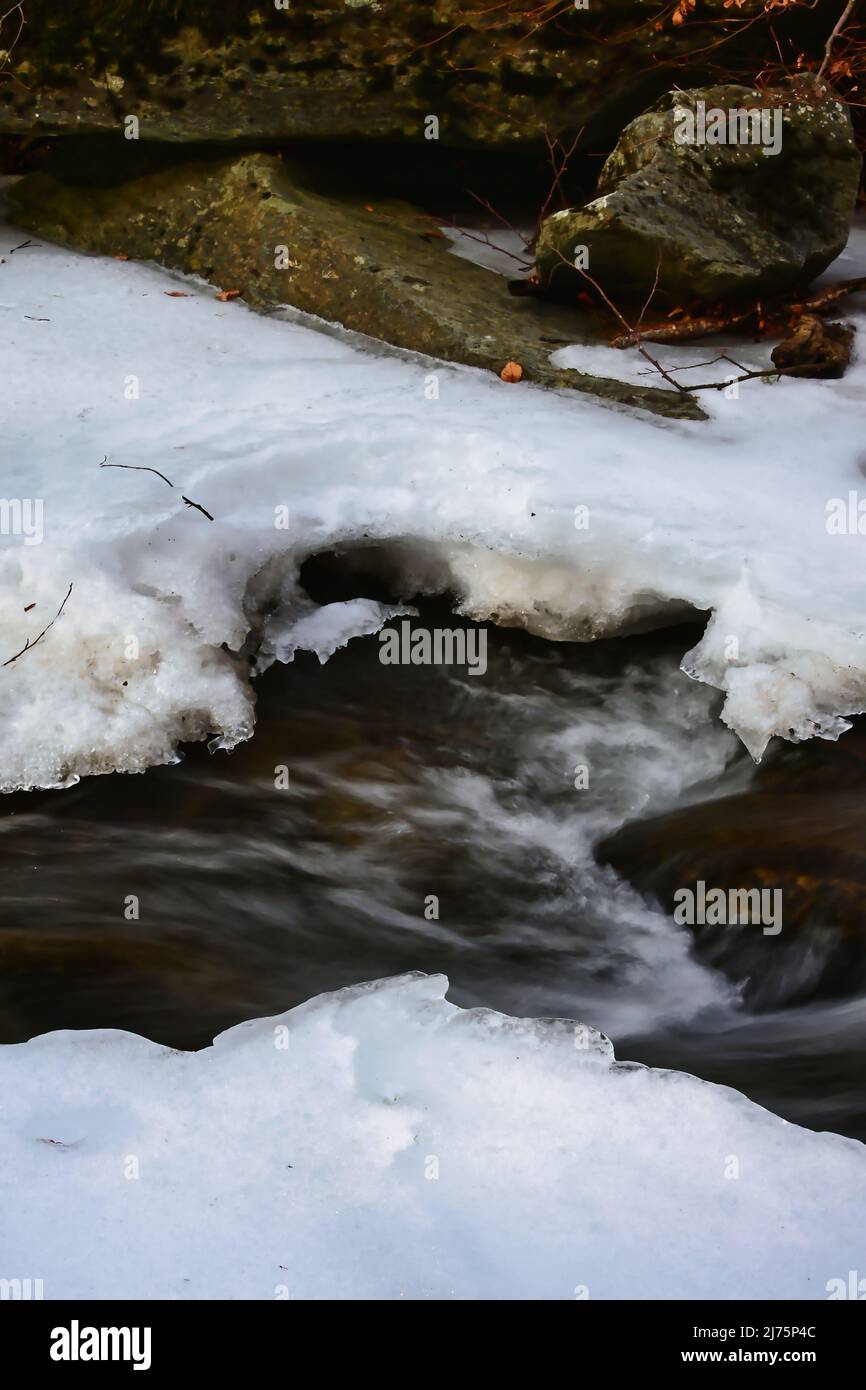 river with icy banks Stock Photo - Alamy