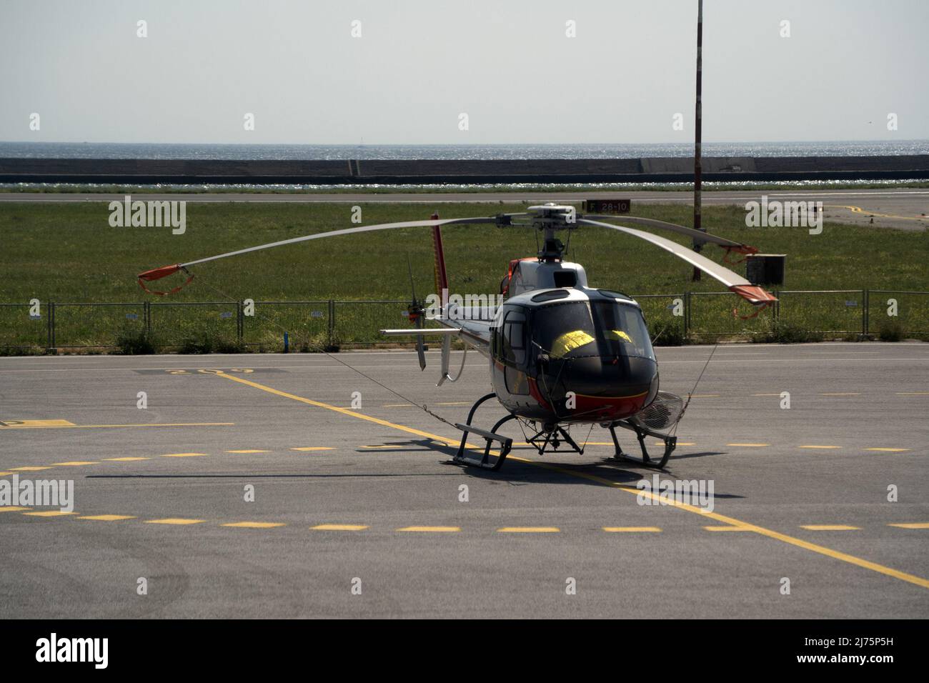 commercial helicopter grounded at the airport detail Stock Photo - Alamy