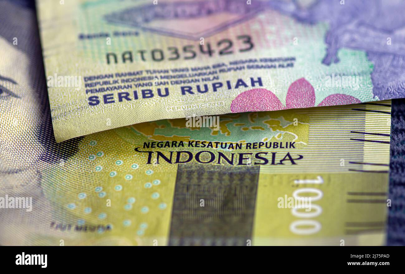 Indonesian money currency, Rupiah, in selected focus Stock Photo - Alamy