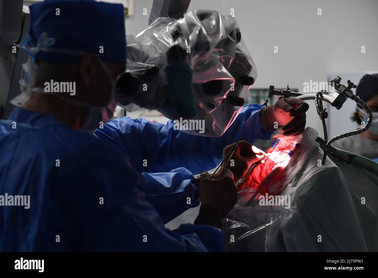 Moscow. Medical employees and the patient in the operating room of the ...