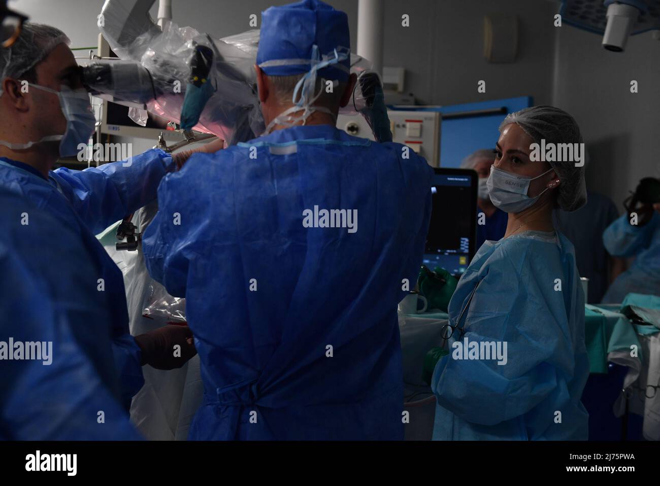 Moscow. Medical employees and the patient in the operating room of the ...