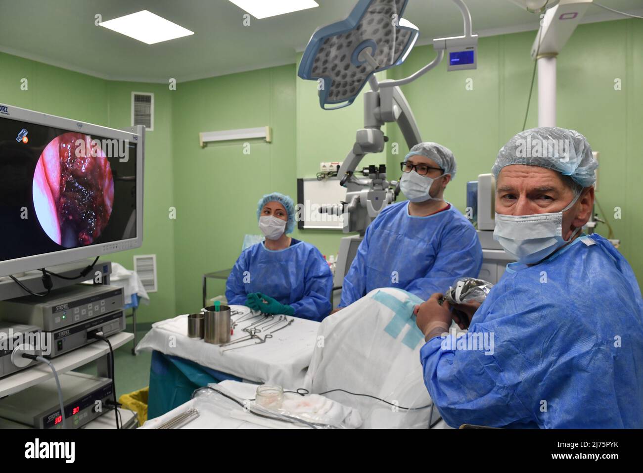 Moscow. Medical employees and the patient in the operating room of the ...