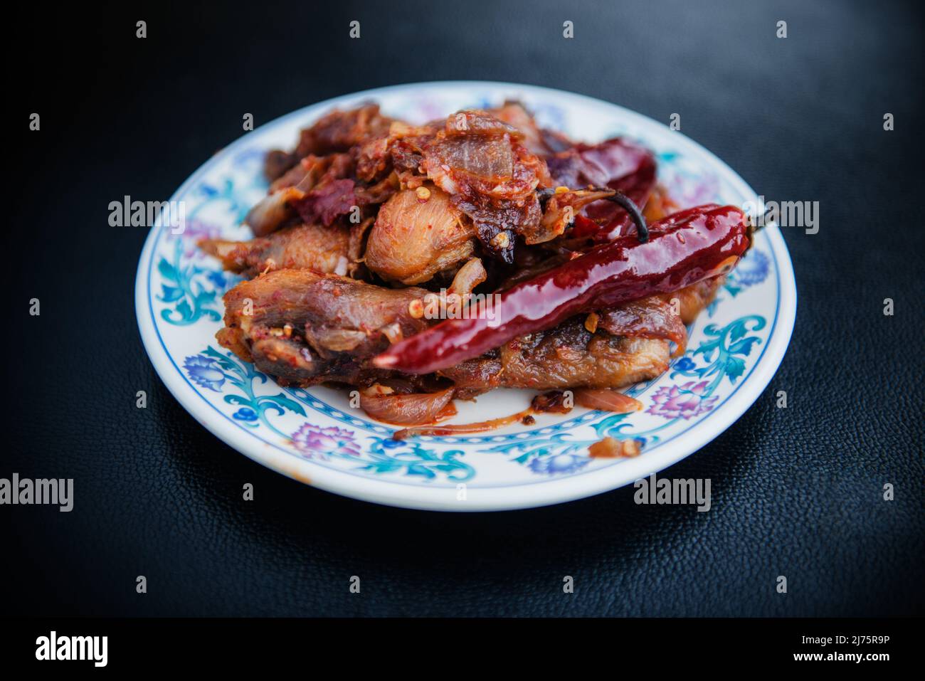 Bhutanese Sikam paa, chicken with chilli Stock Photo - Alamy