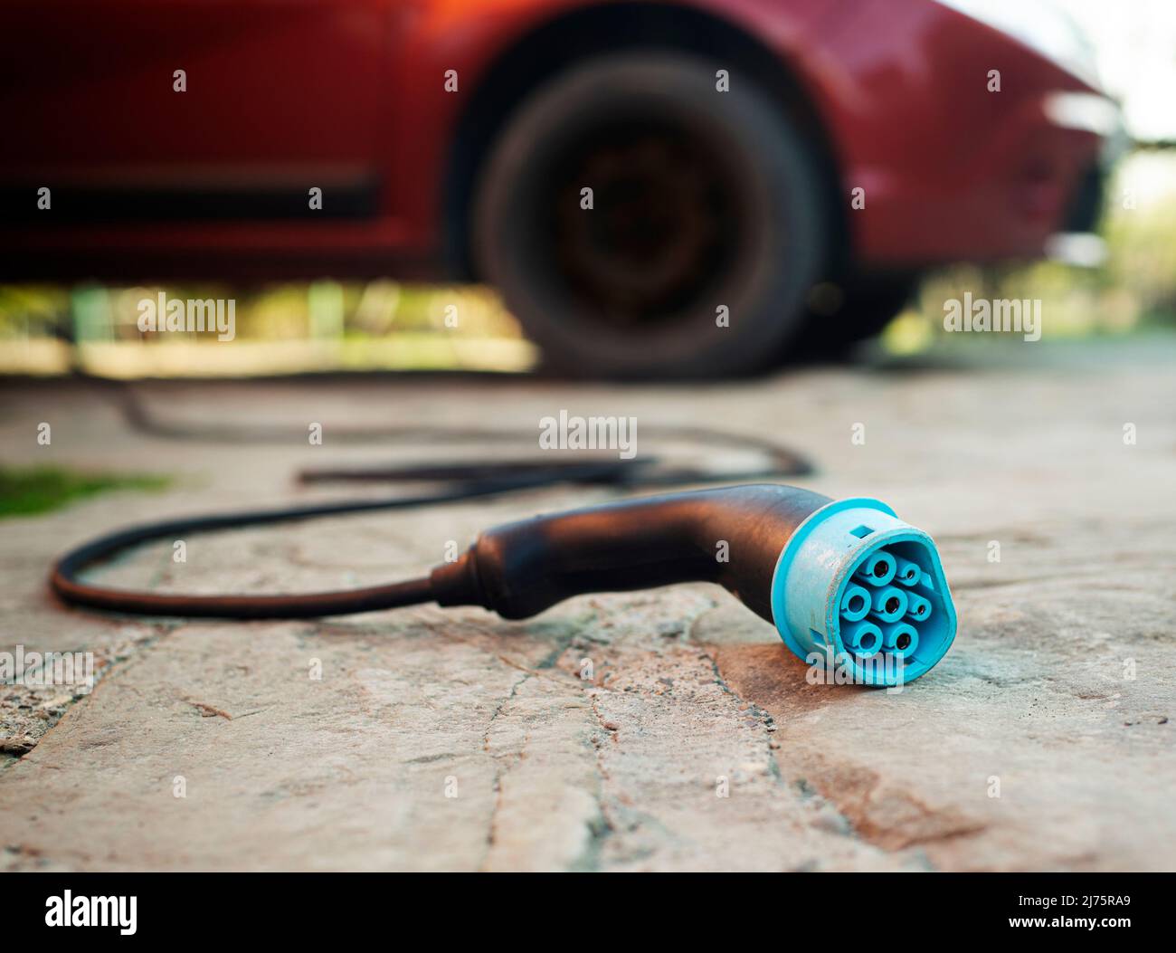 Closeup view at Electric car charging plug Stock Photo - Alamy