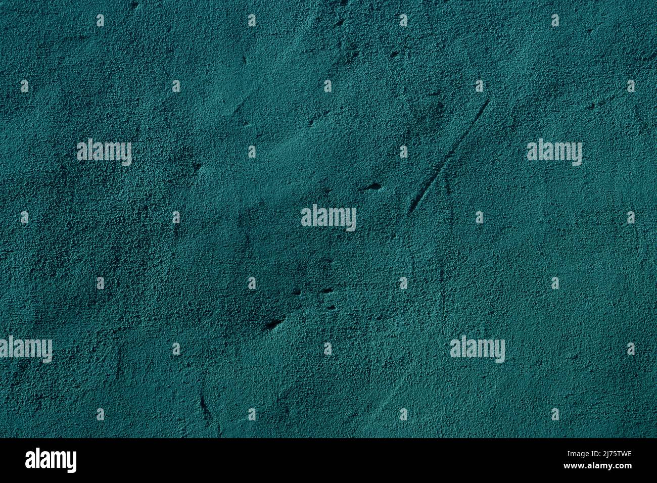 Petrol colored wall background with textures of different shades of ...