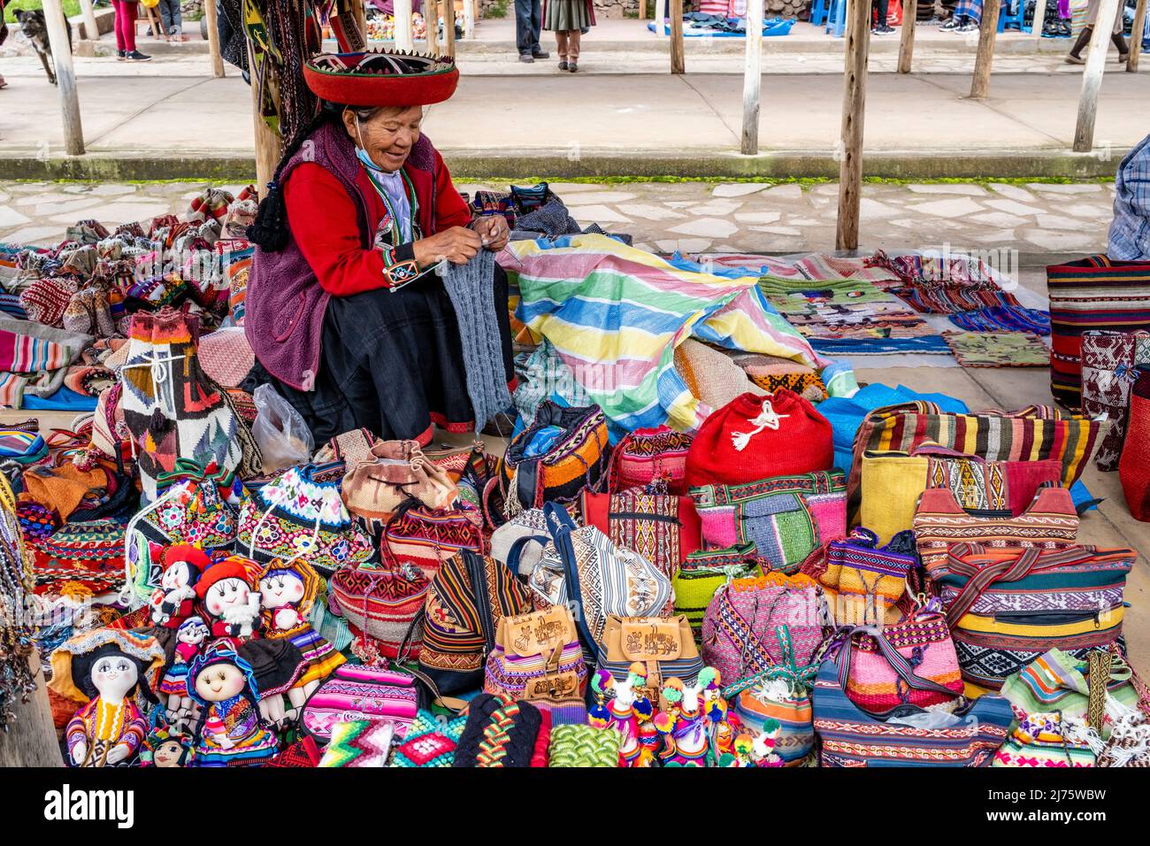 A Peruvian Indigenous Quechua Woman Selling Woollen Handicrafts At The ...