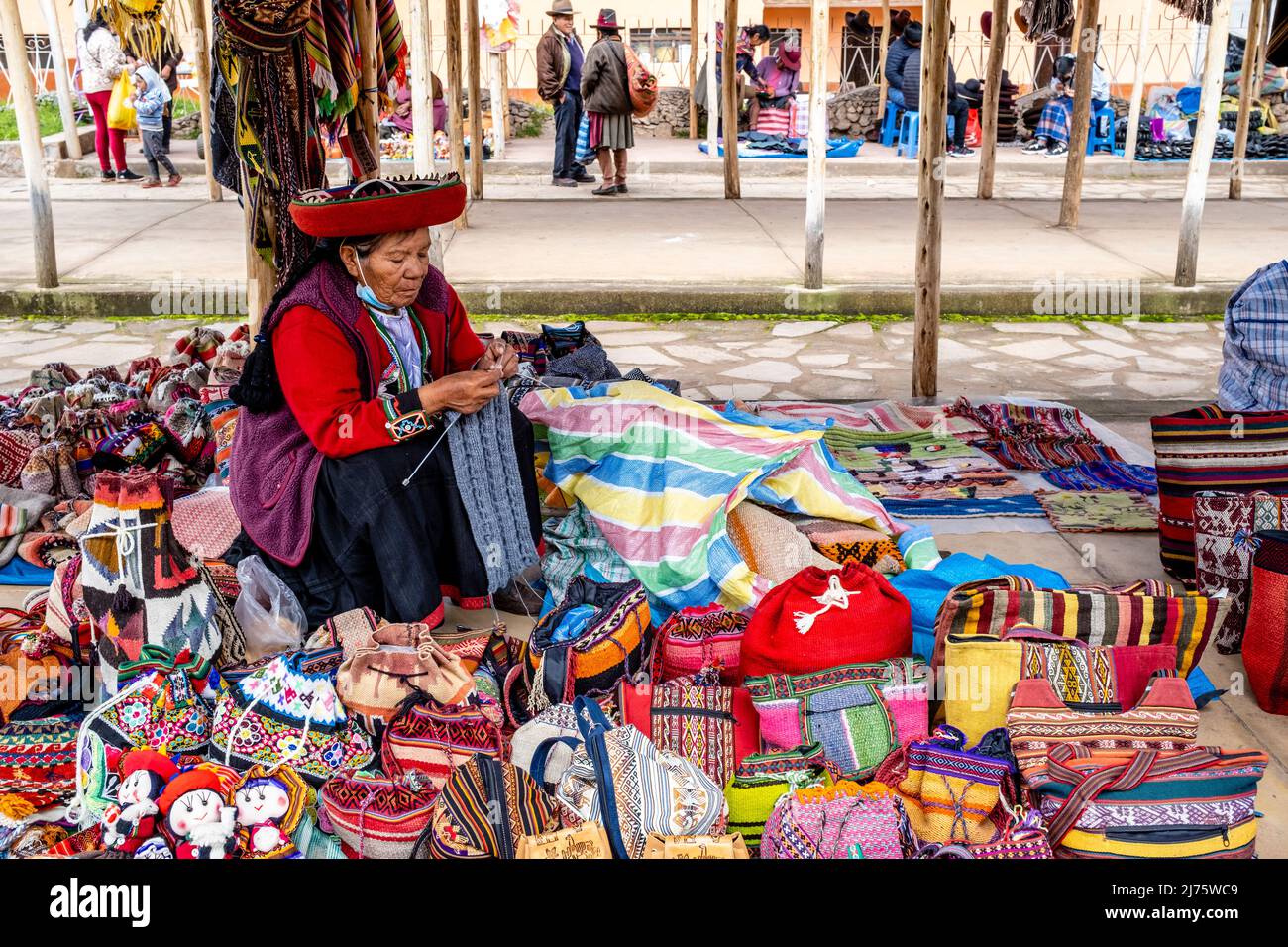 A Peruvian Indigenous Quechua Woman Selling Woollen Handicrafts At The ...